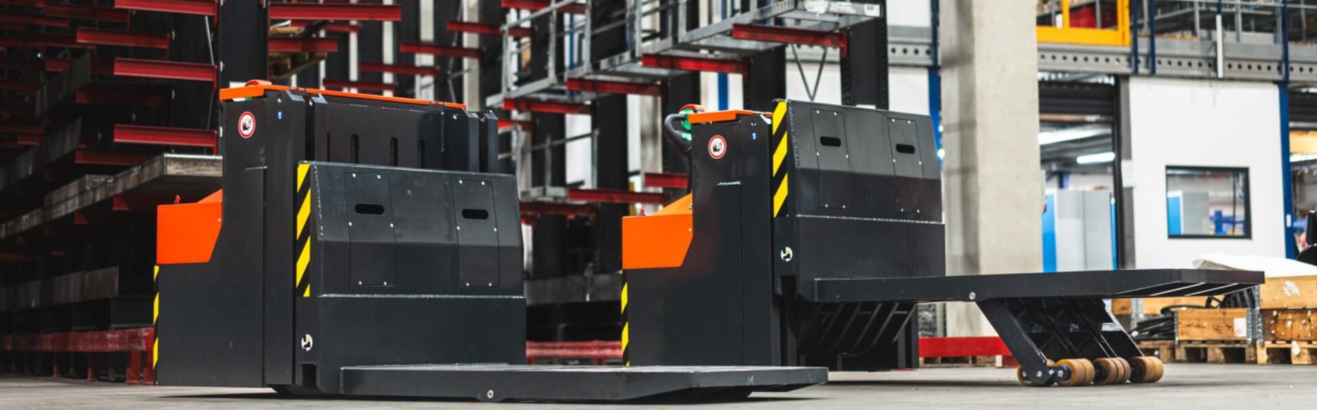 Transpallet elettrico - DIMOS Maschinenbau GmbH - con conducente seduto ...