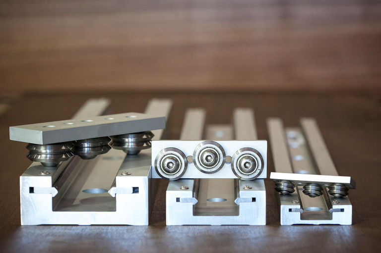 Guida lineare a rulli - Modern Linear - in alluminio / compatta / a binario